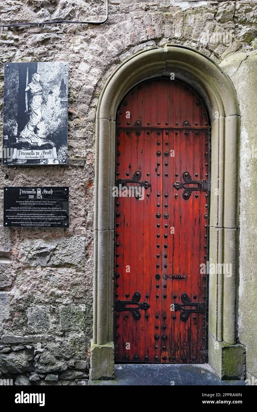 Medieval passageway in Kilkenny, with a memorial plaque about a woman ...