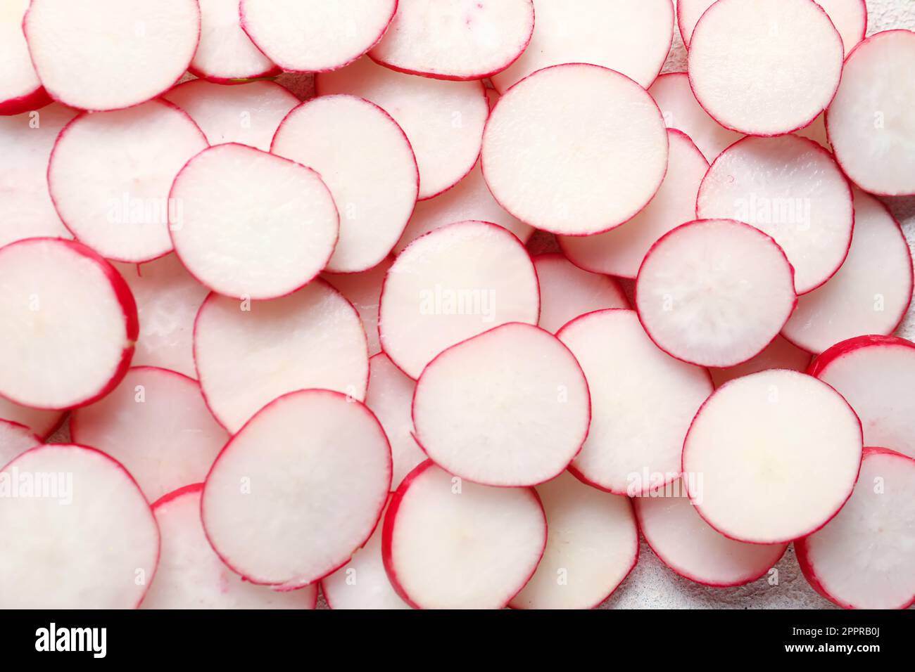 Texture of fresh sliced radish Stock Photo - Alamy