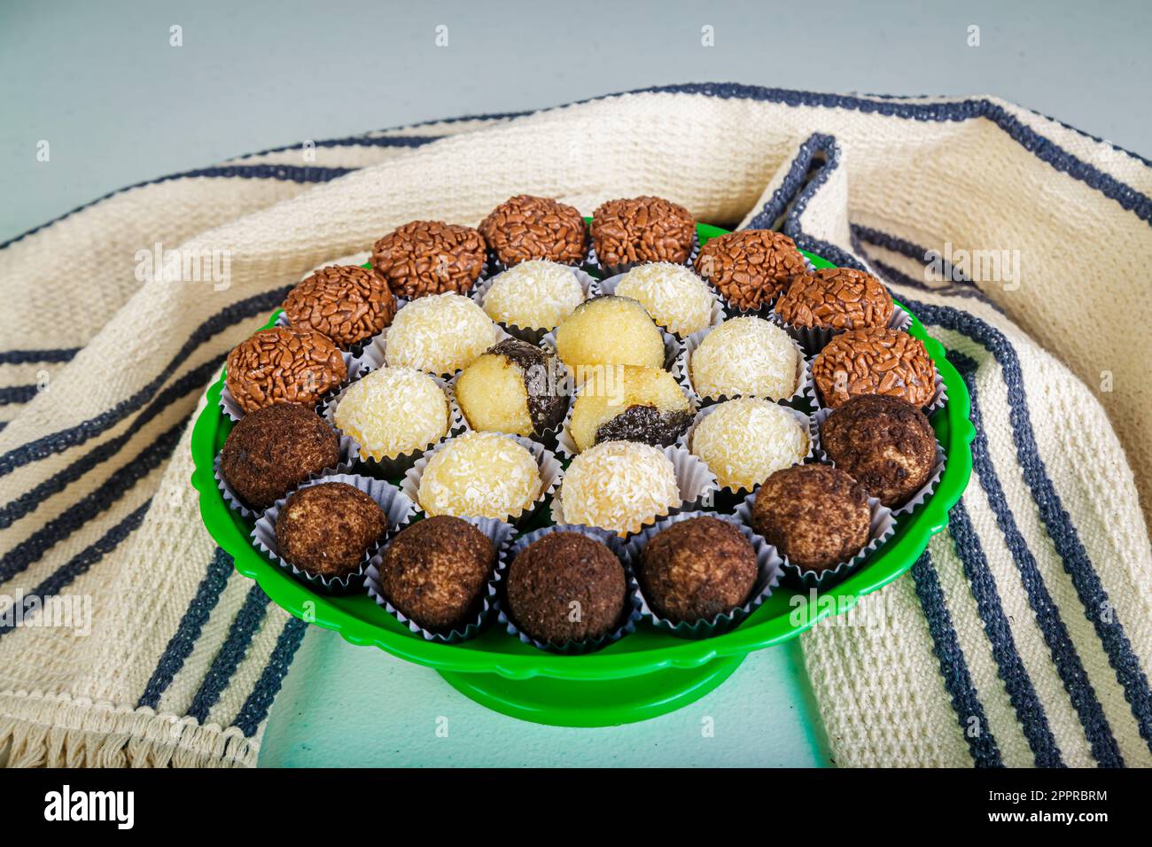 Brigadeiro (Brigadier) and coconut candy Traditional brazilian sweet ...