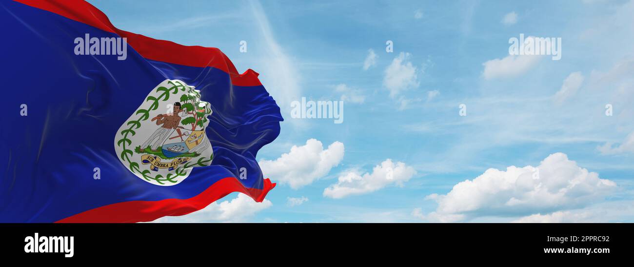 flag of English Creole peoples Belizeans at cloudy sky background ...