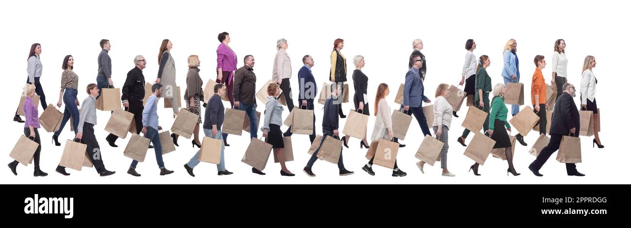 a group of people are running paper shopping bags Stock Photo - Alamy