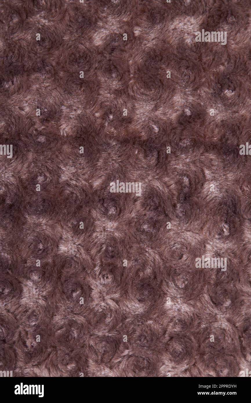 Wavy brown, dark beige faux wool. Artificial wool of a sheep. Fabric ...