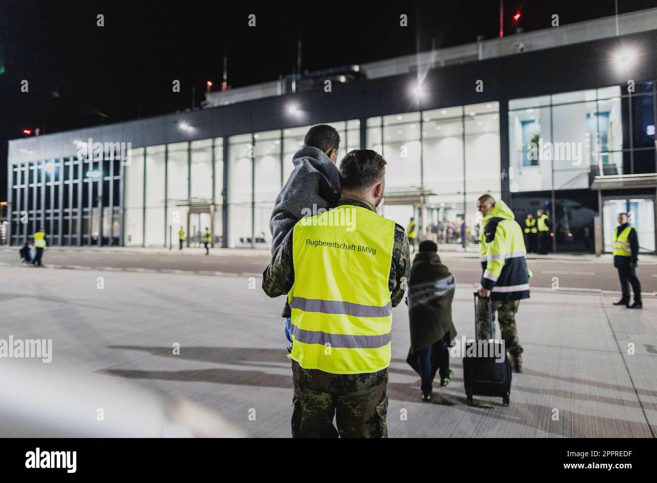 People from Sudan arrive at BER Airport after their successful ...