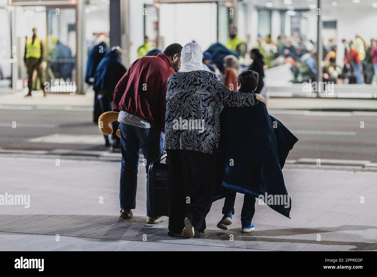 People from Sudan arrive at BER Airport after their successful ...