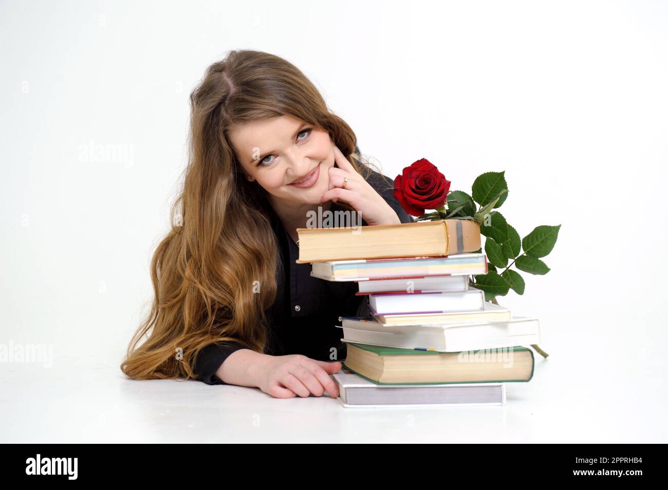 Bored Girl student and pile of books young pretty smart woman with lots ...