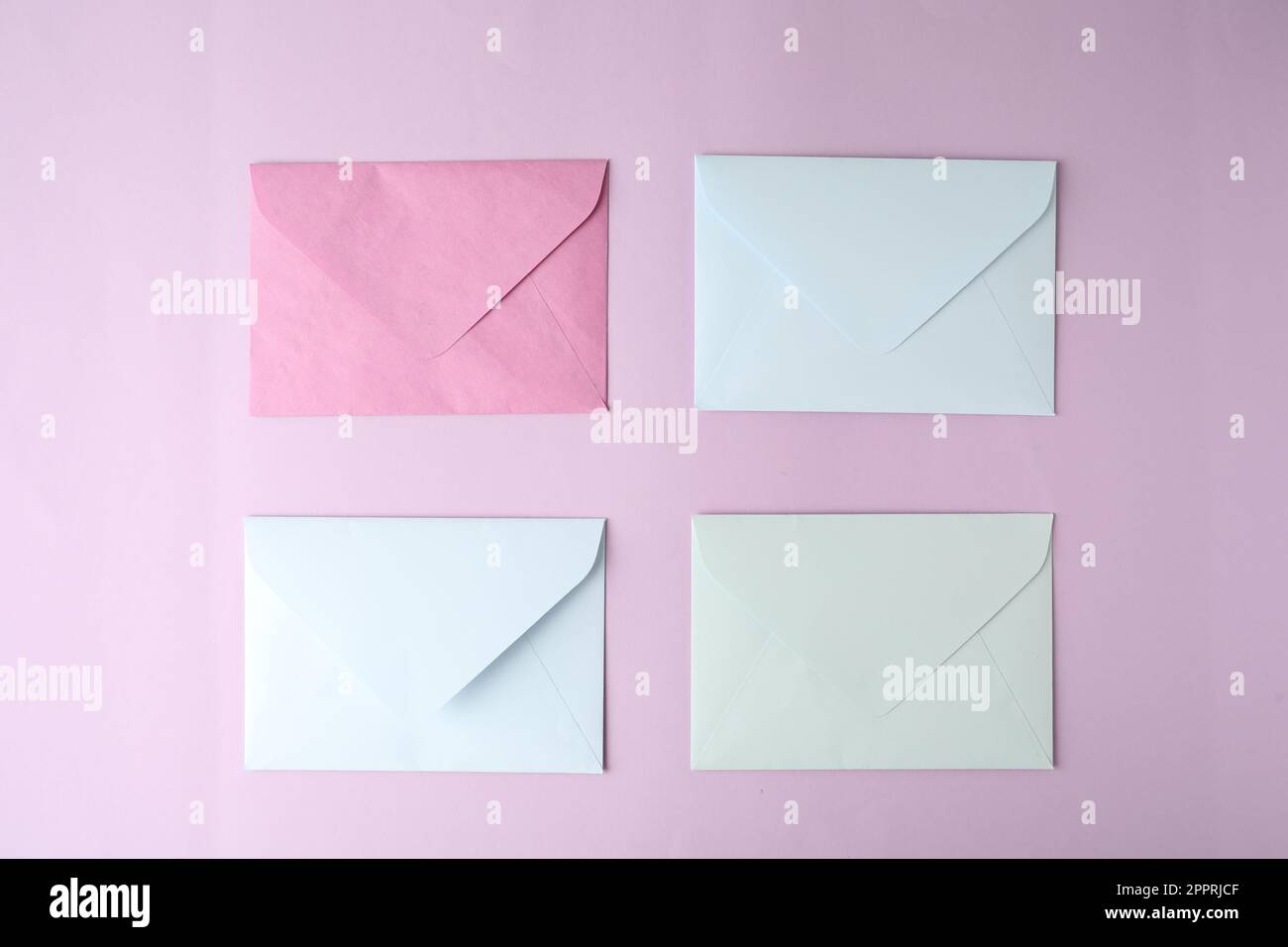 Light pink envelopes hi-res stock photography and images - Alamy