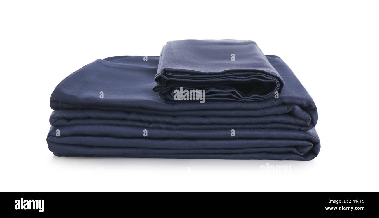 Stack of clean silky bed linen isolated on white Stock Photo - Alamy