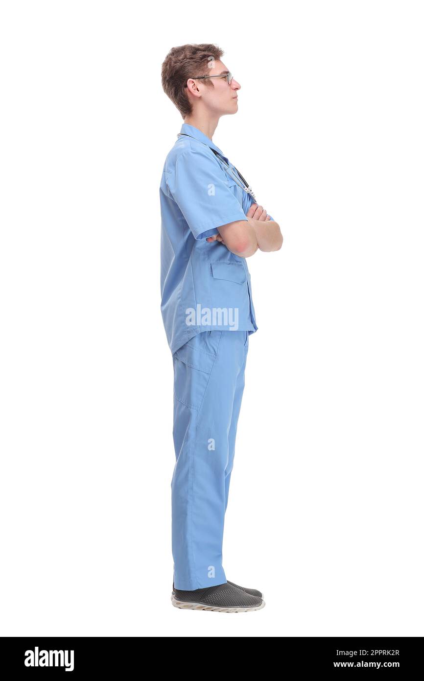 Full length profile shot of a young male doctor in a blue uniform ...