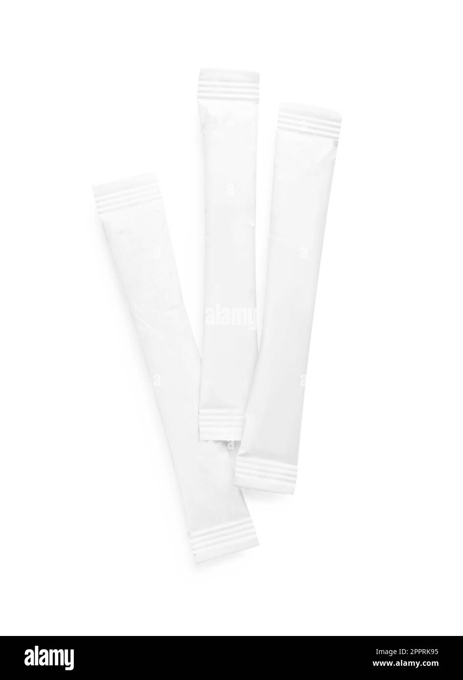 Paper sticks of sugar on white background, top view Stock Photo - Alamy