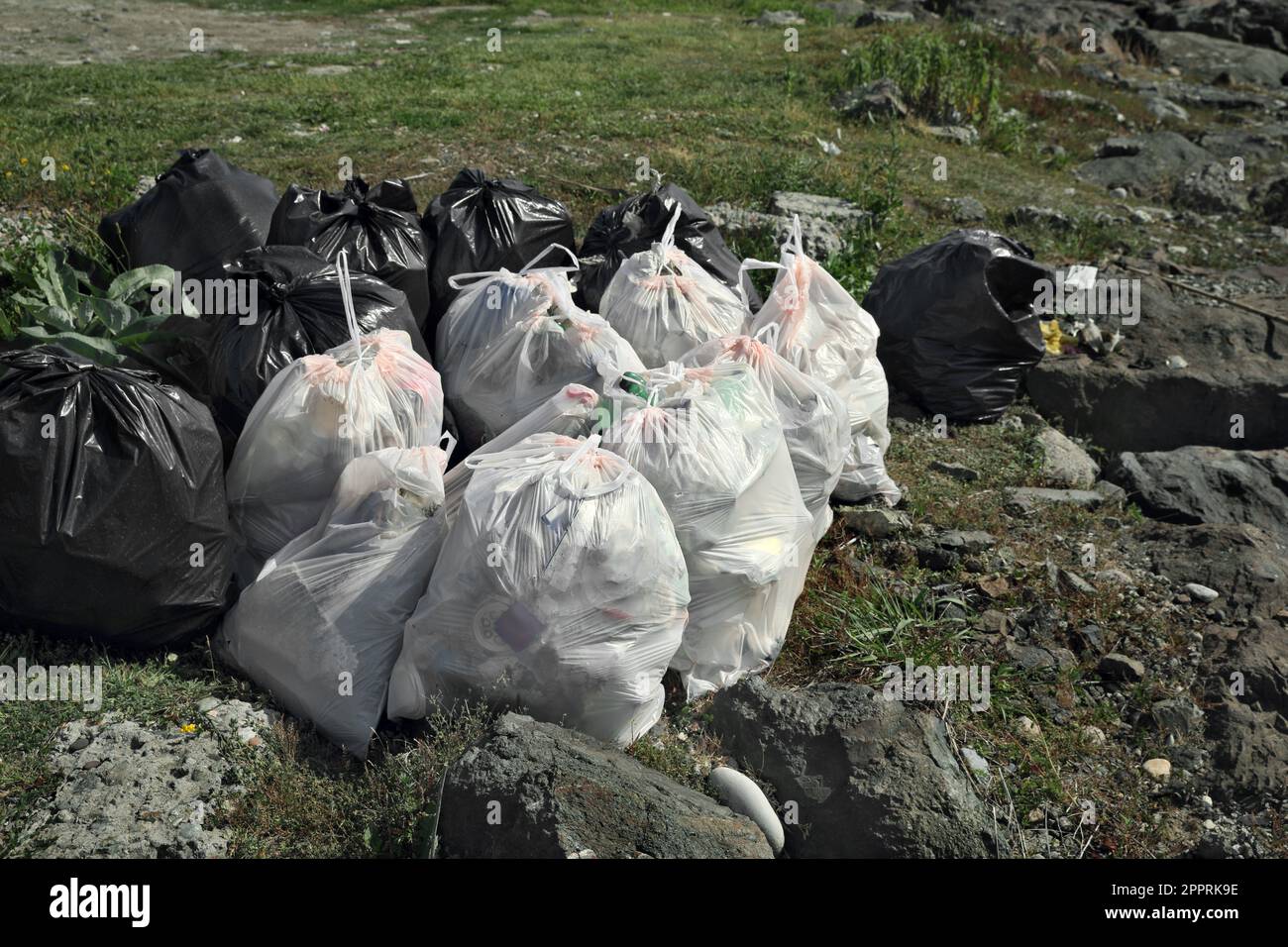 Garbage concept black trash bags hi-res stock photography and images ...