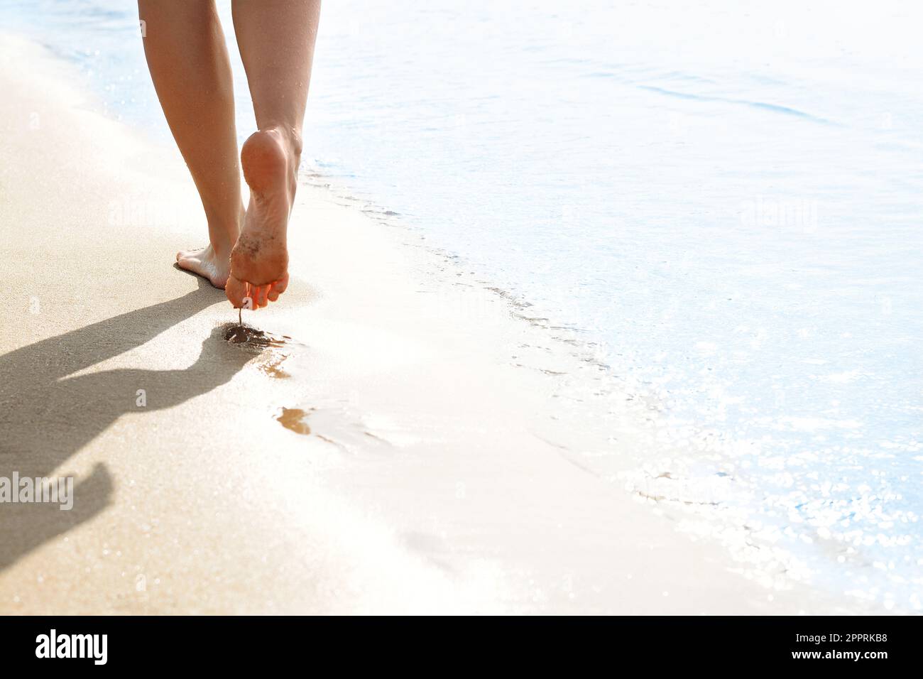Closeup barefoot on sand woman hi-res stock photography and images - Alamy