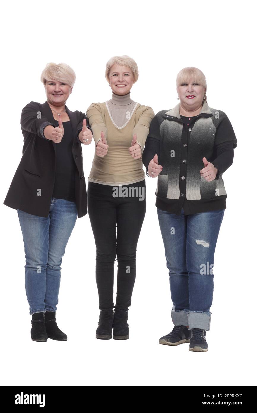 in full growth. three happy women standing together Stock Photo - Alamy