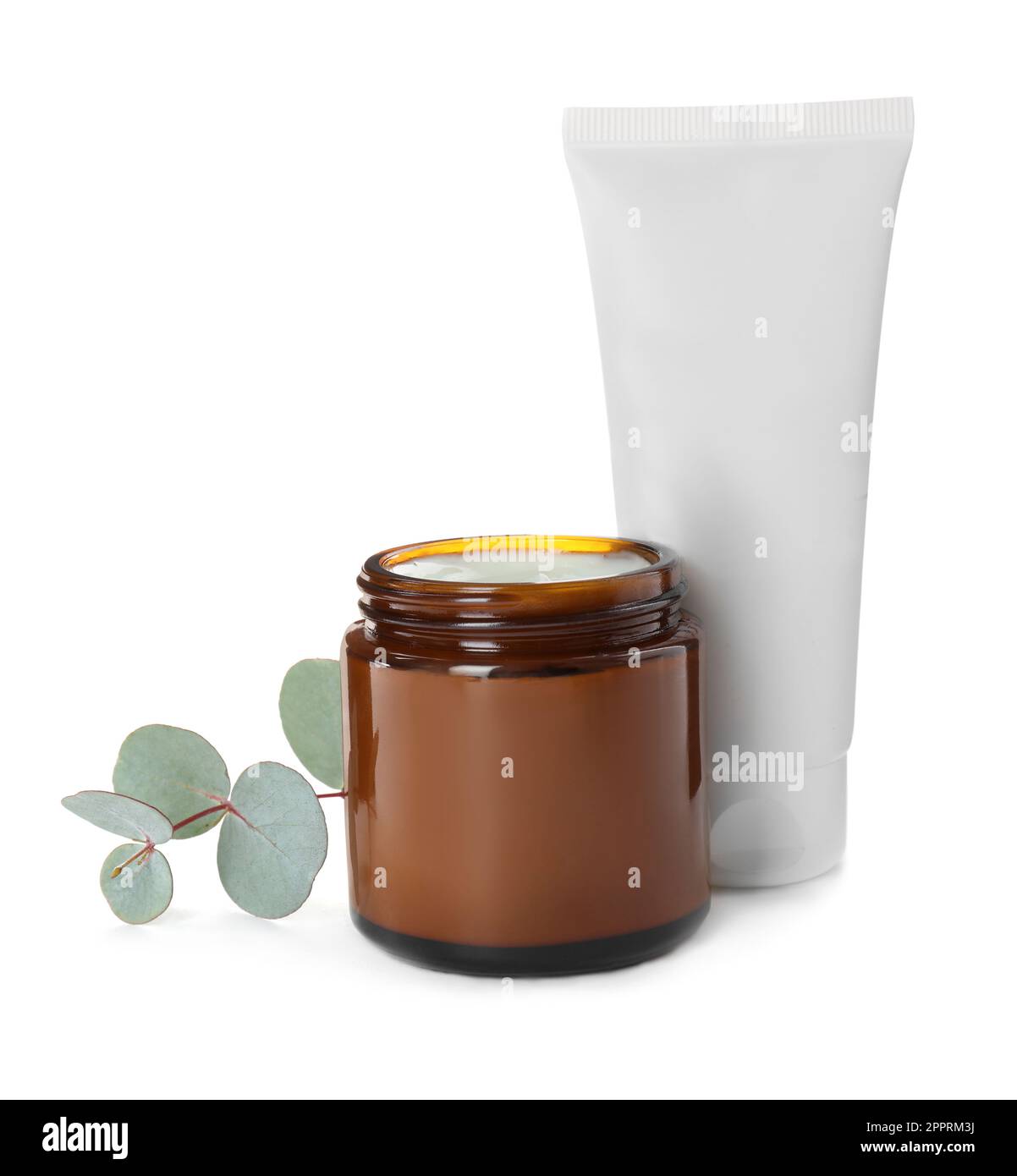 Different hand care cosmetic products and eucalyptus on white ...