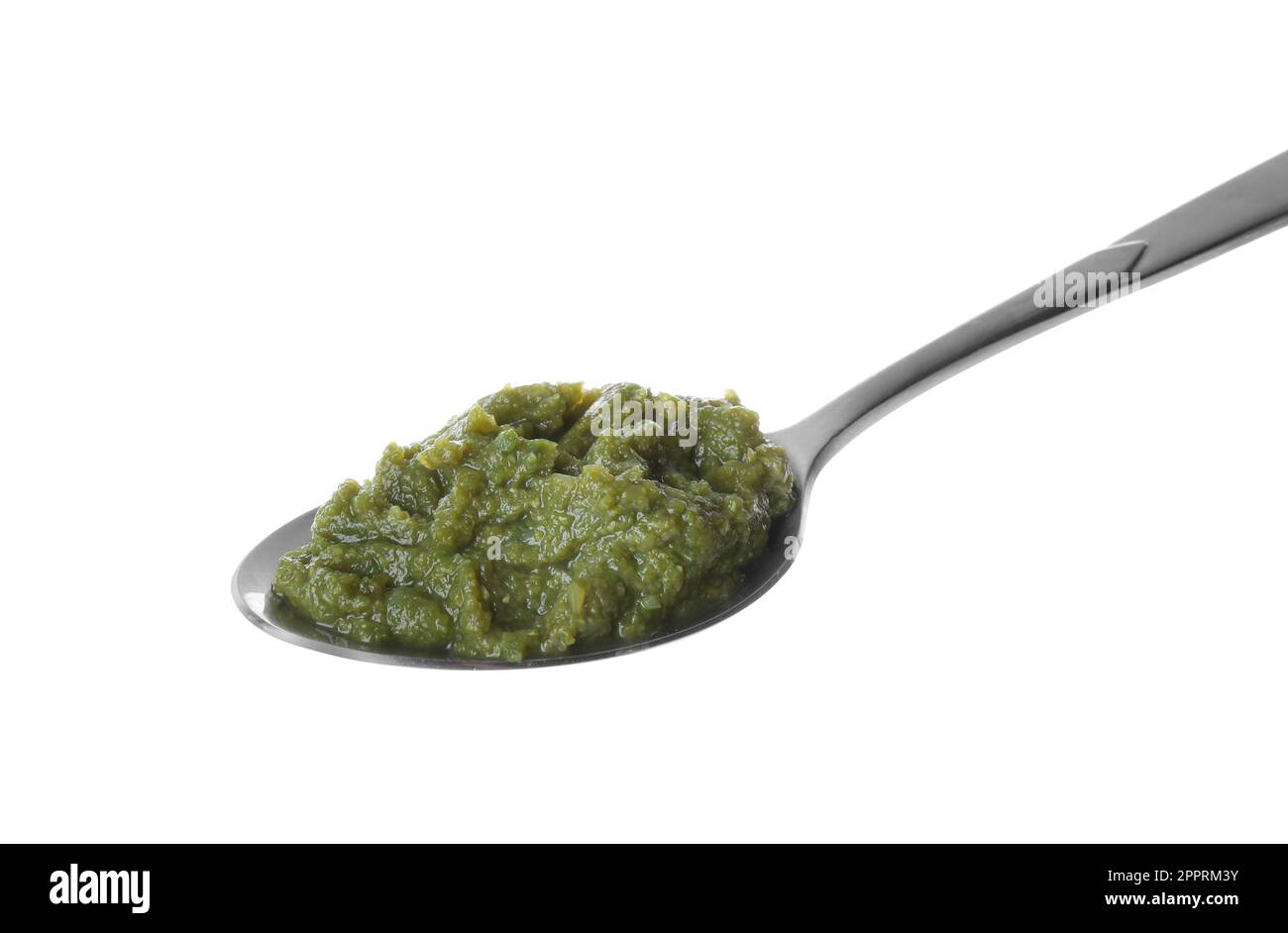 Spoon with green tasty puree on white background Stock Photo - Alamy