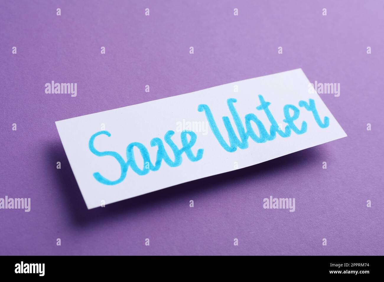 Card with words Save Water on purple background Stock Photo - Alamy
