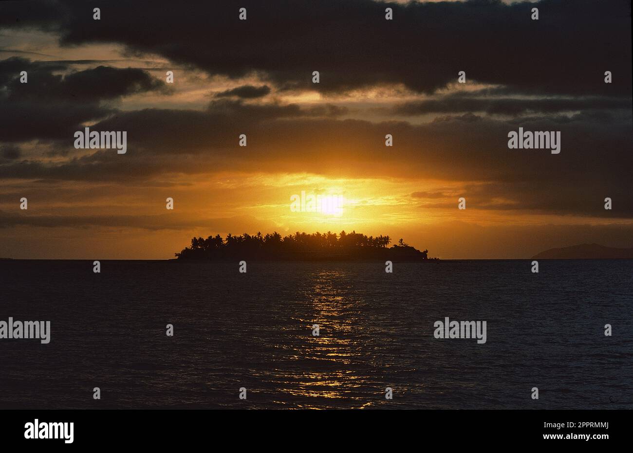 Sunset over Beachcomber Island from Treasure Island, Fiji Stock Photo ...