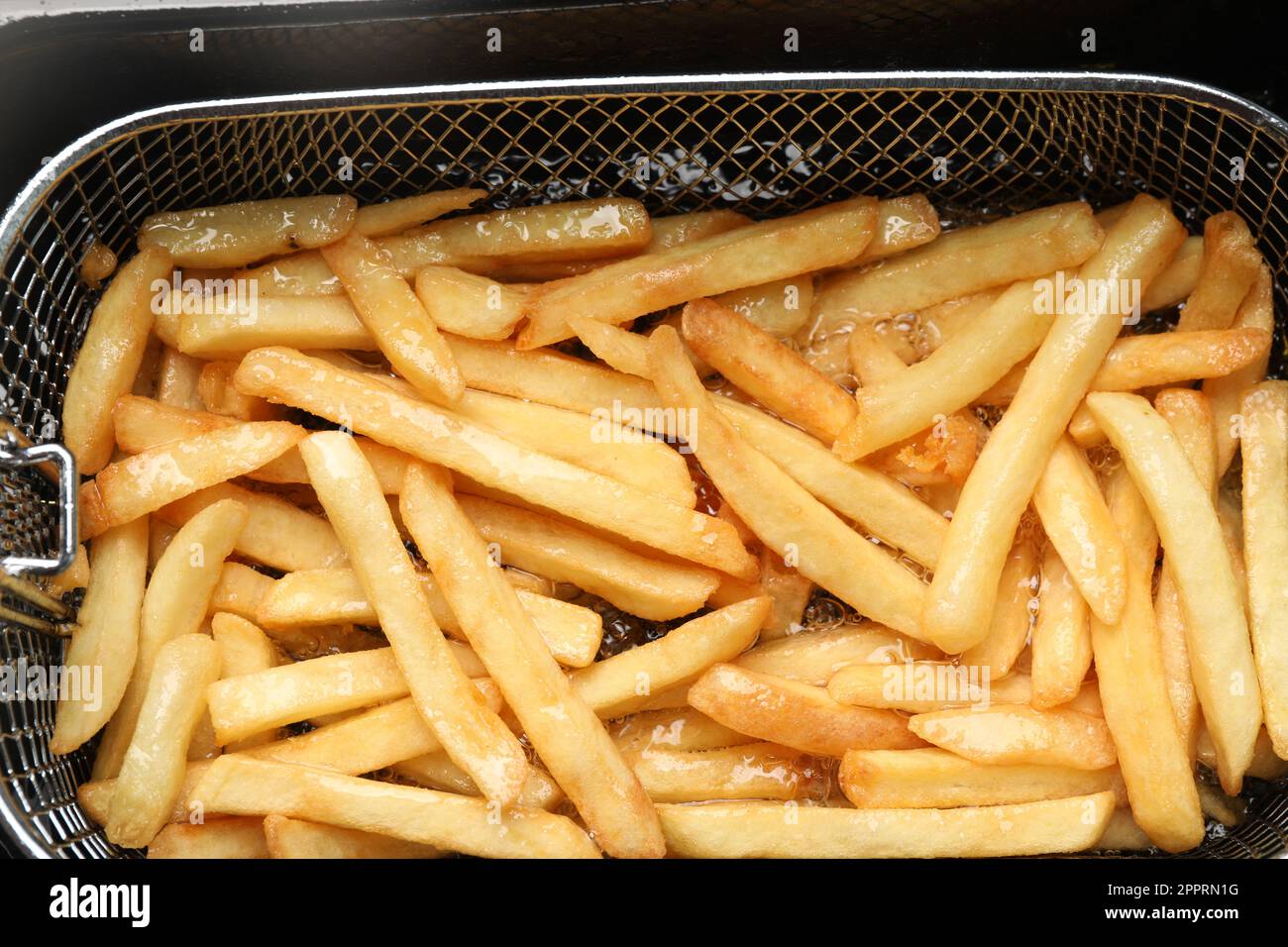 Process cooking french fries in hi-res stock photography and images - Alamy
