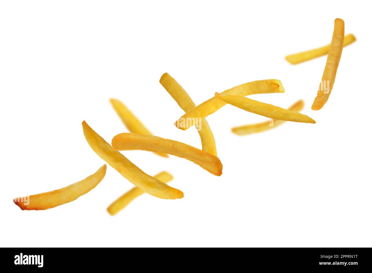 Tasty french fries falling on white background Stock Photo - Alamy