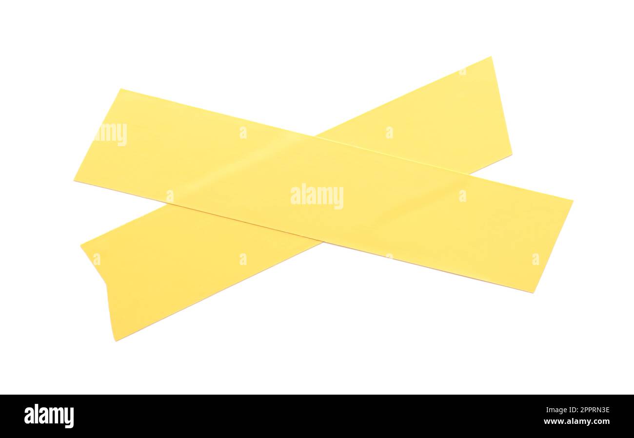 Cross of yellow insulating tape isolated on white, top view Stock Photo ...
