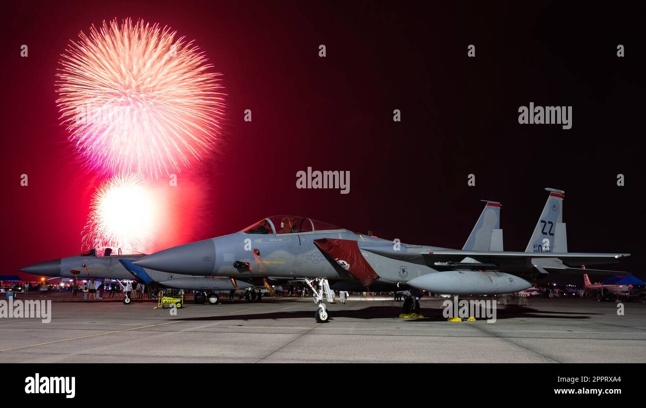 U.S. Air Force F-15C Eagles are on display as a fireworks presentation closes out day one of ...
