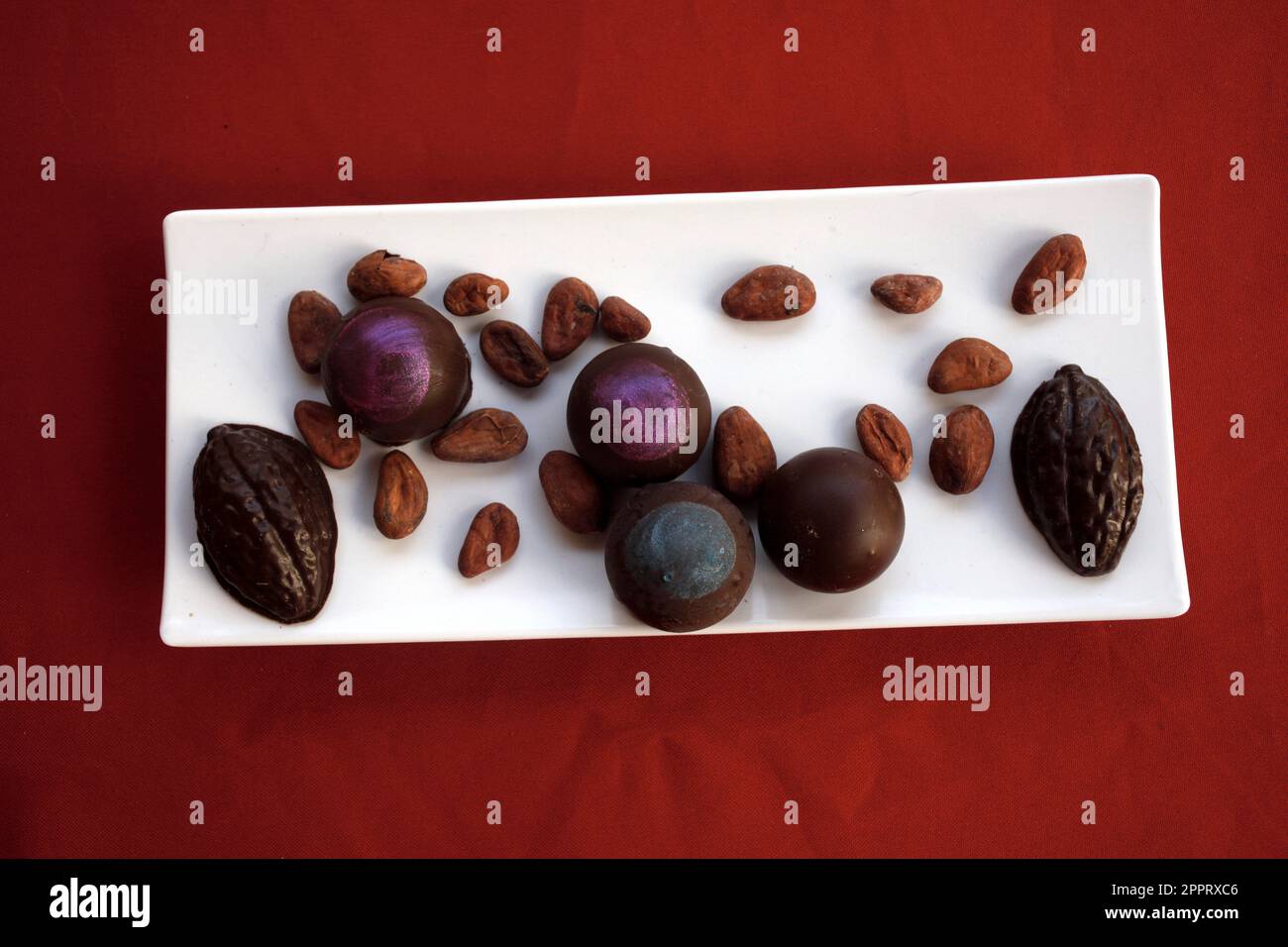 Chocolate pieces and natural seeds Stock Photo - Alamy