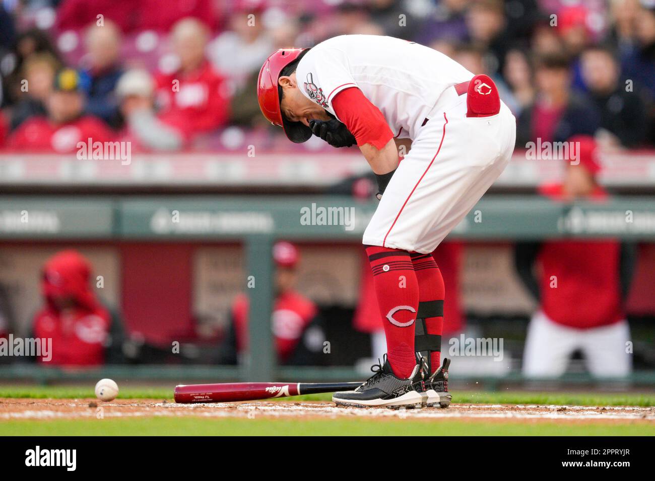 Cincinnati Reds' TJ Friedl reacts after being hit by a pitch in the ...