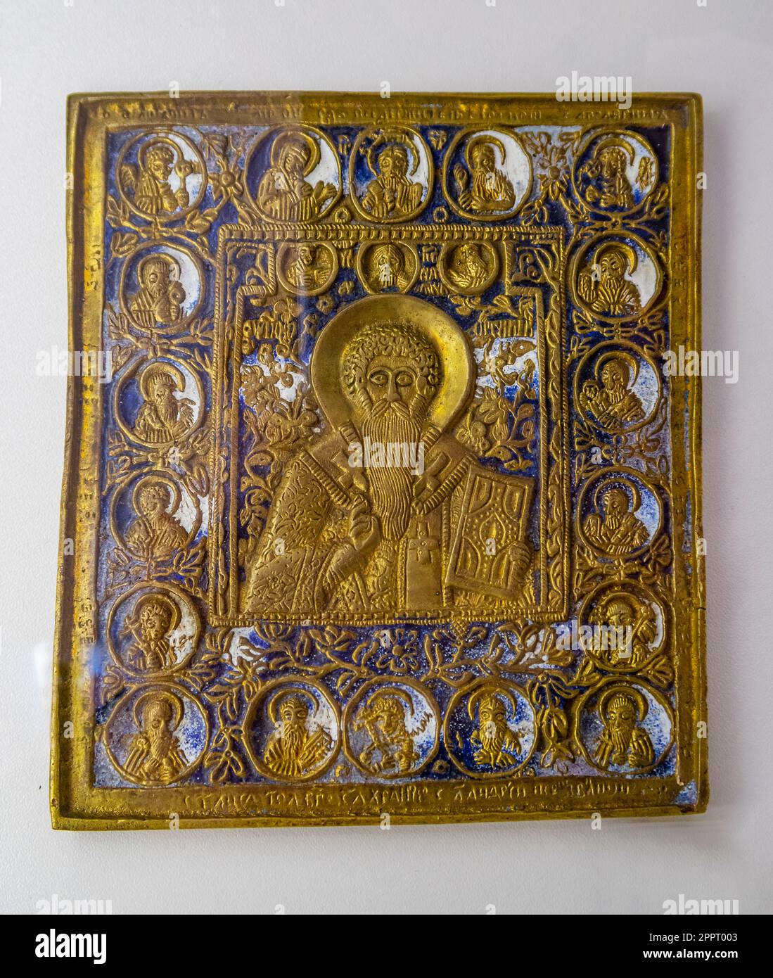 Medieval gilded glazed icon with the faces of saints Stock Photo - Alamy