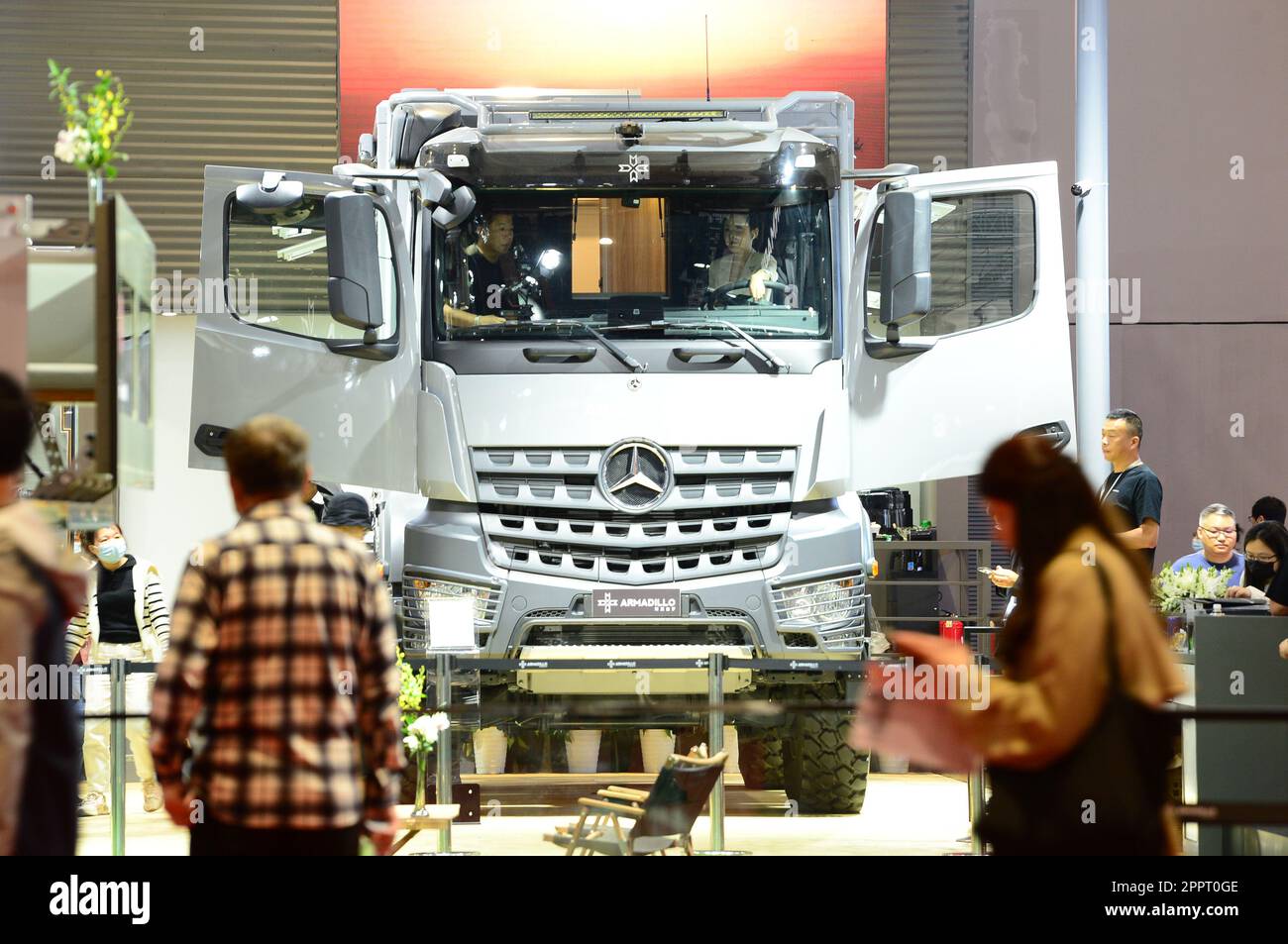 SHANGHAI, CHINA - APRIL 21, 2023 - Visitors look at the display of an ...