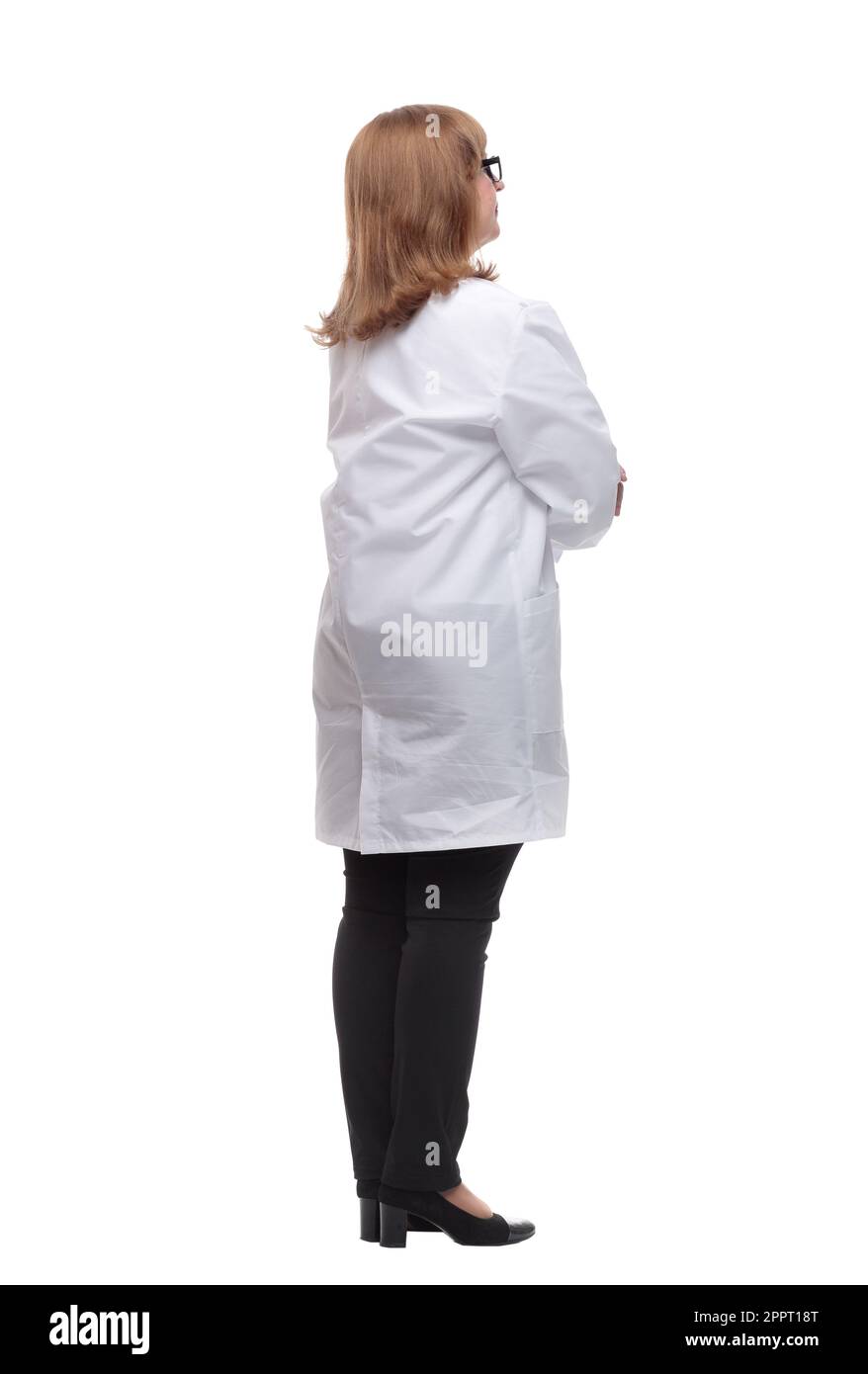 side view. serious female medic looking at a white screen Stock Photo ...