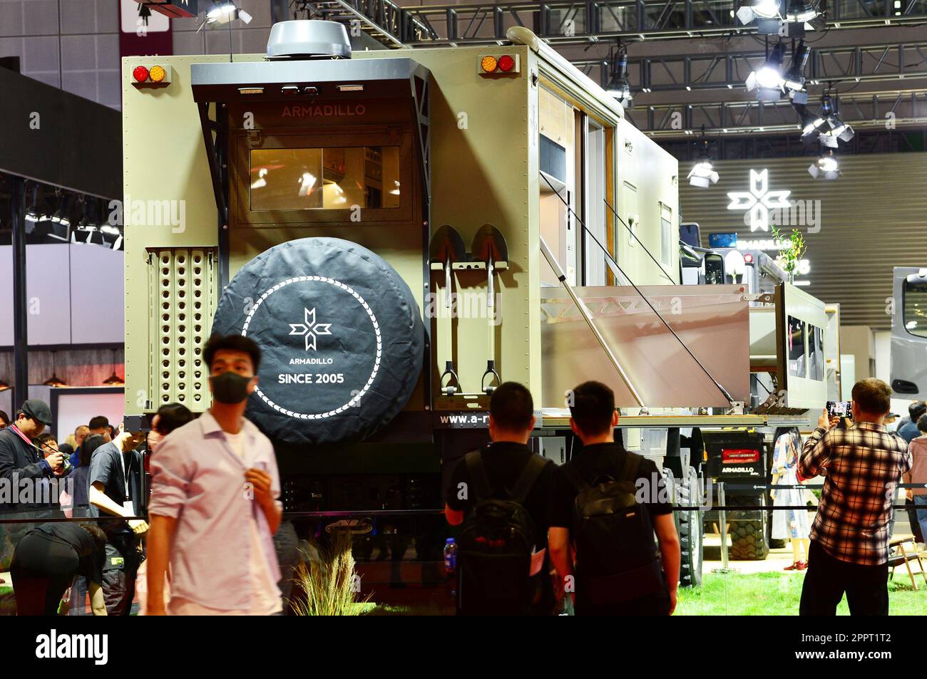 SHANGHAI, CHINA - APRIL 21, 2023 - Visitors look at the display of an ...
