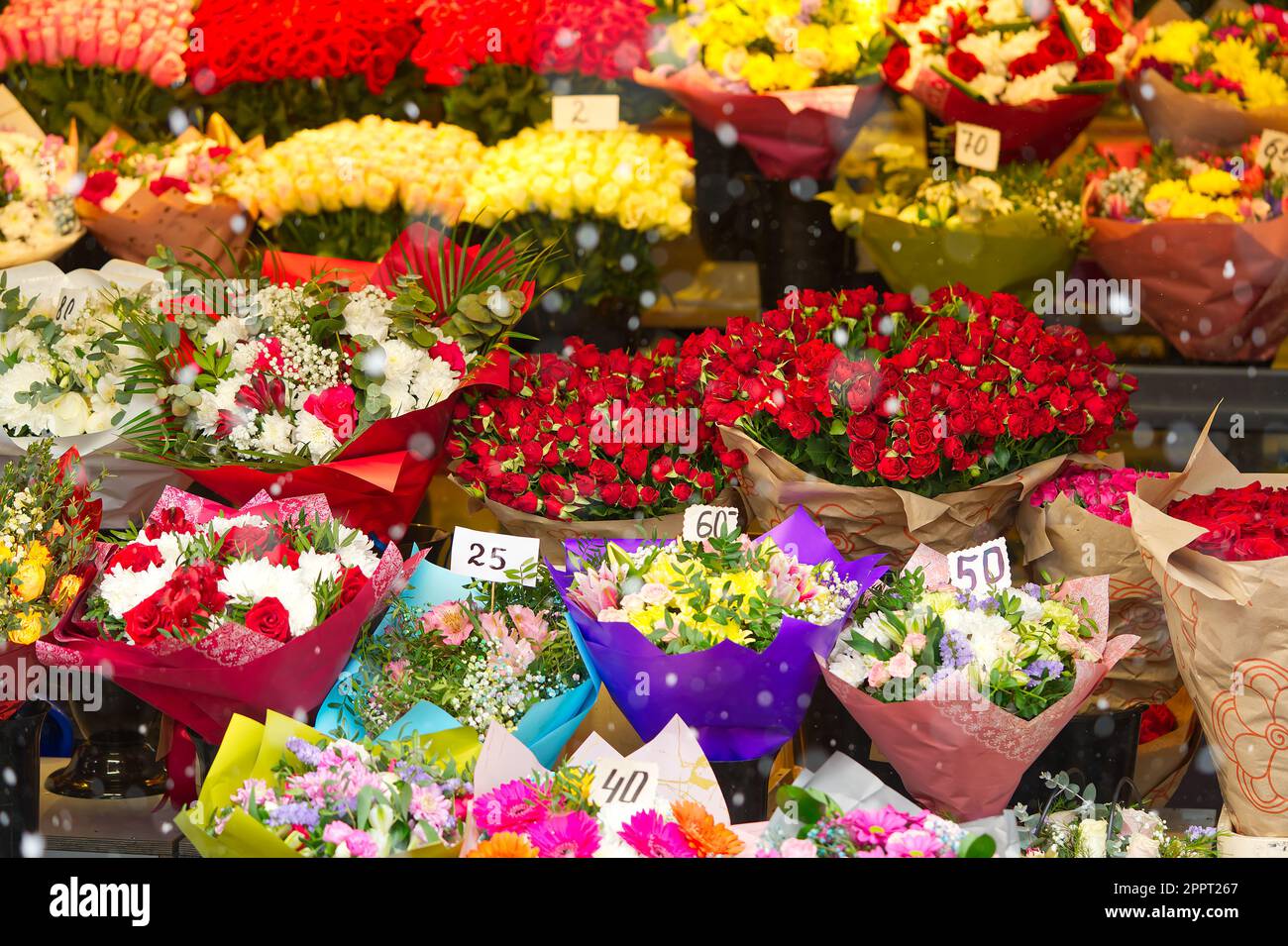 Colorful roses bouquet display in front of flower shop. Flower ...