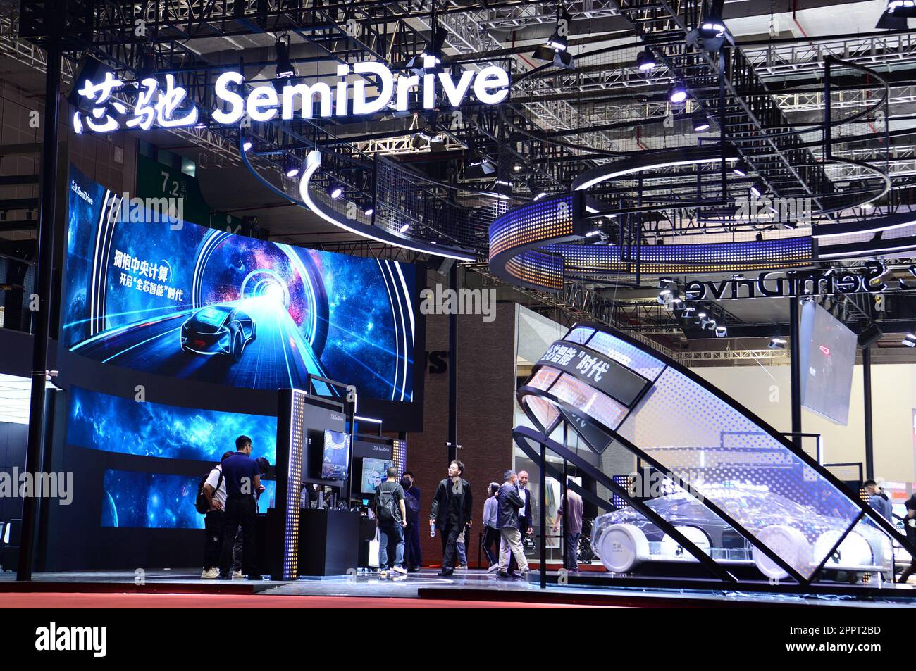 SHANGHAI, CHINA - APRIL 20, 2023 - Visitors look at cars at the booth of SemiDrive Technology ...