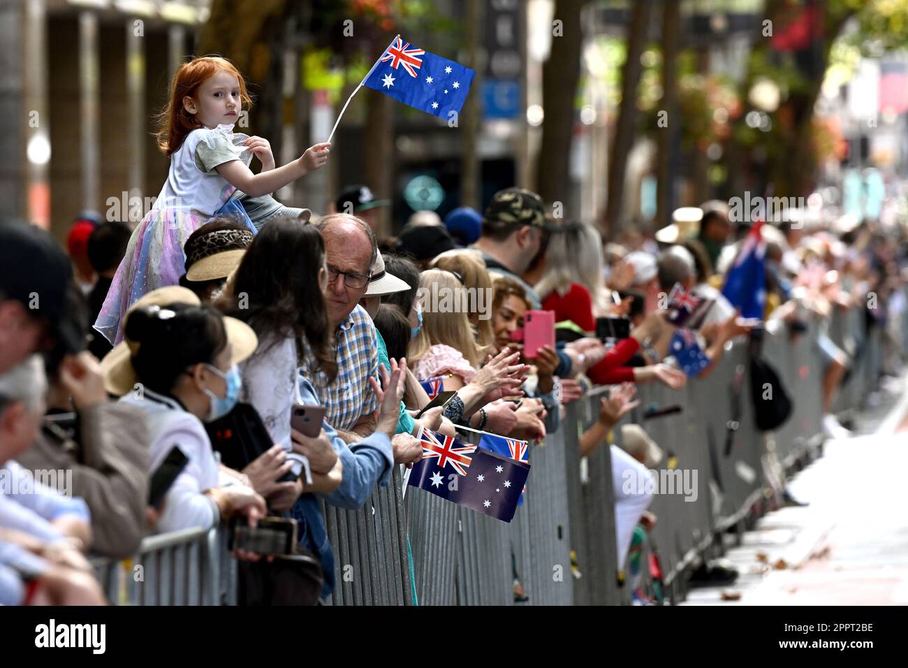 Spectators watch on during the ANZAC Day March in Sydney, Tuesday ...