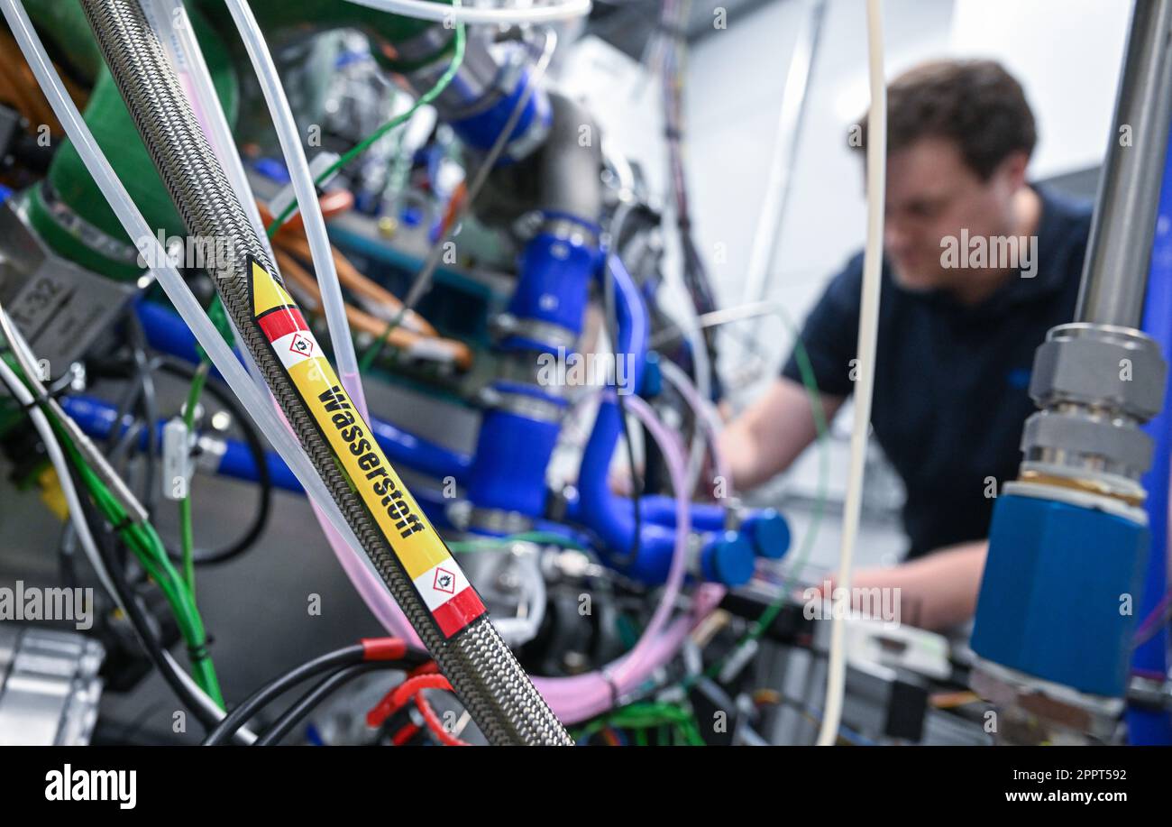 Stuttgart, Germany. 21st Apr, 2023. An employee of the automotive ...