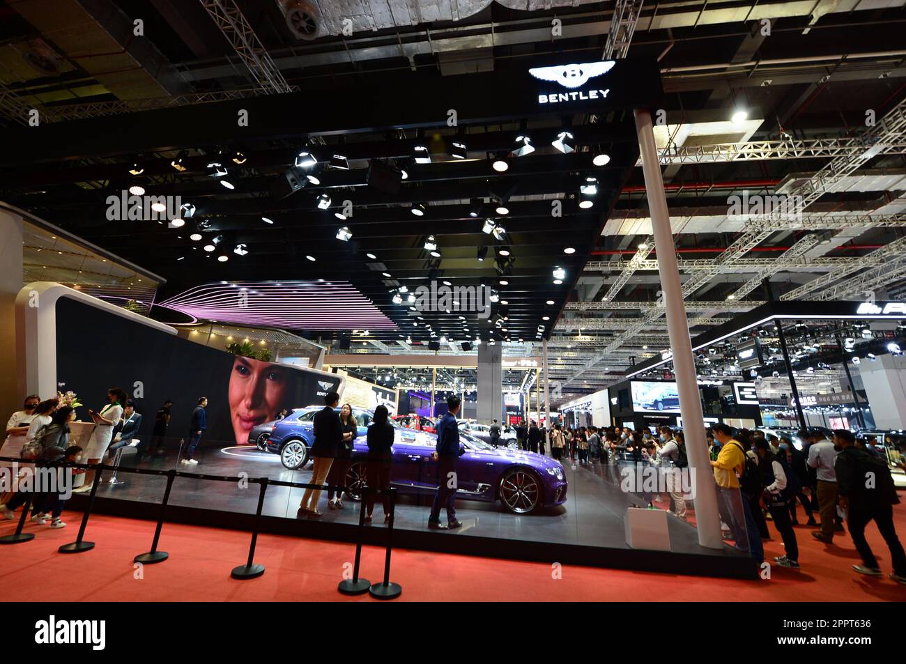 SHANGHAI, CHINA - APRIL 21, 2023 - Visitors gather at the Bentley booth ...