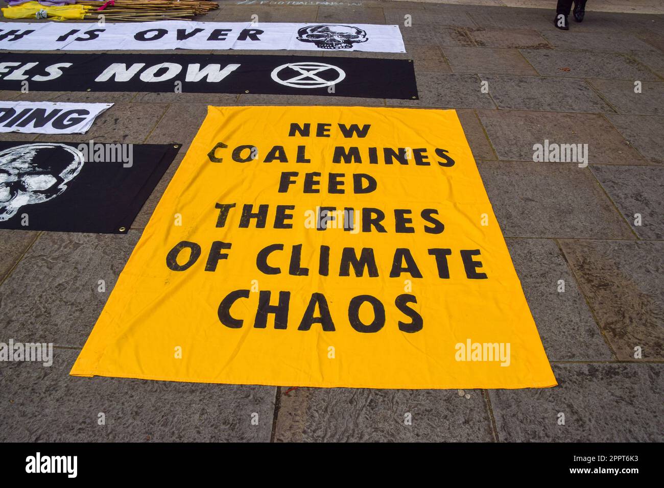 London, UK. 24th Apr, 2023. An anti-coal mine banner is seen during the ...