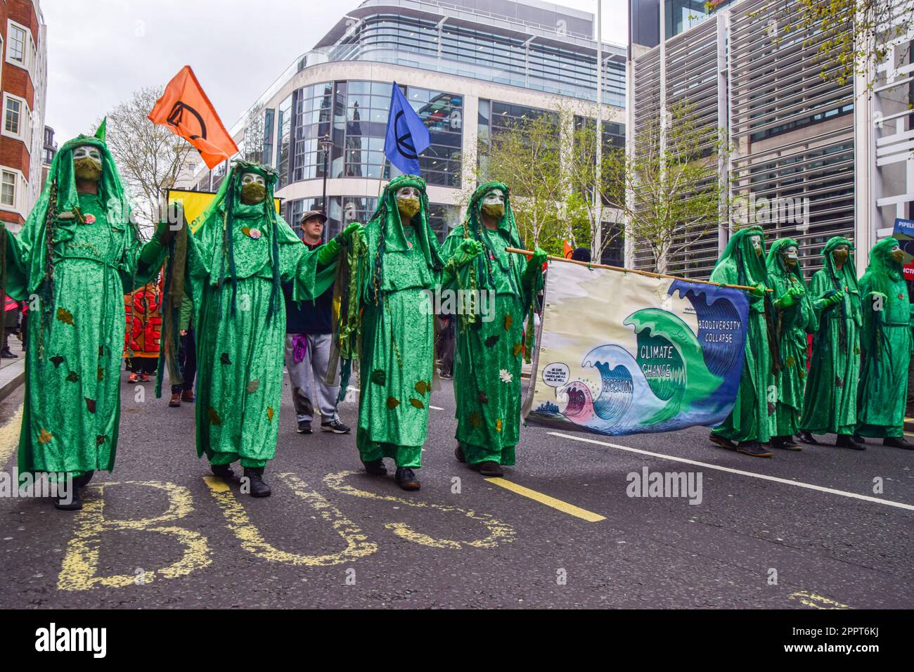 London, UK. 24th Apr, 2023. Protesters wearing costumes known as 'The ...