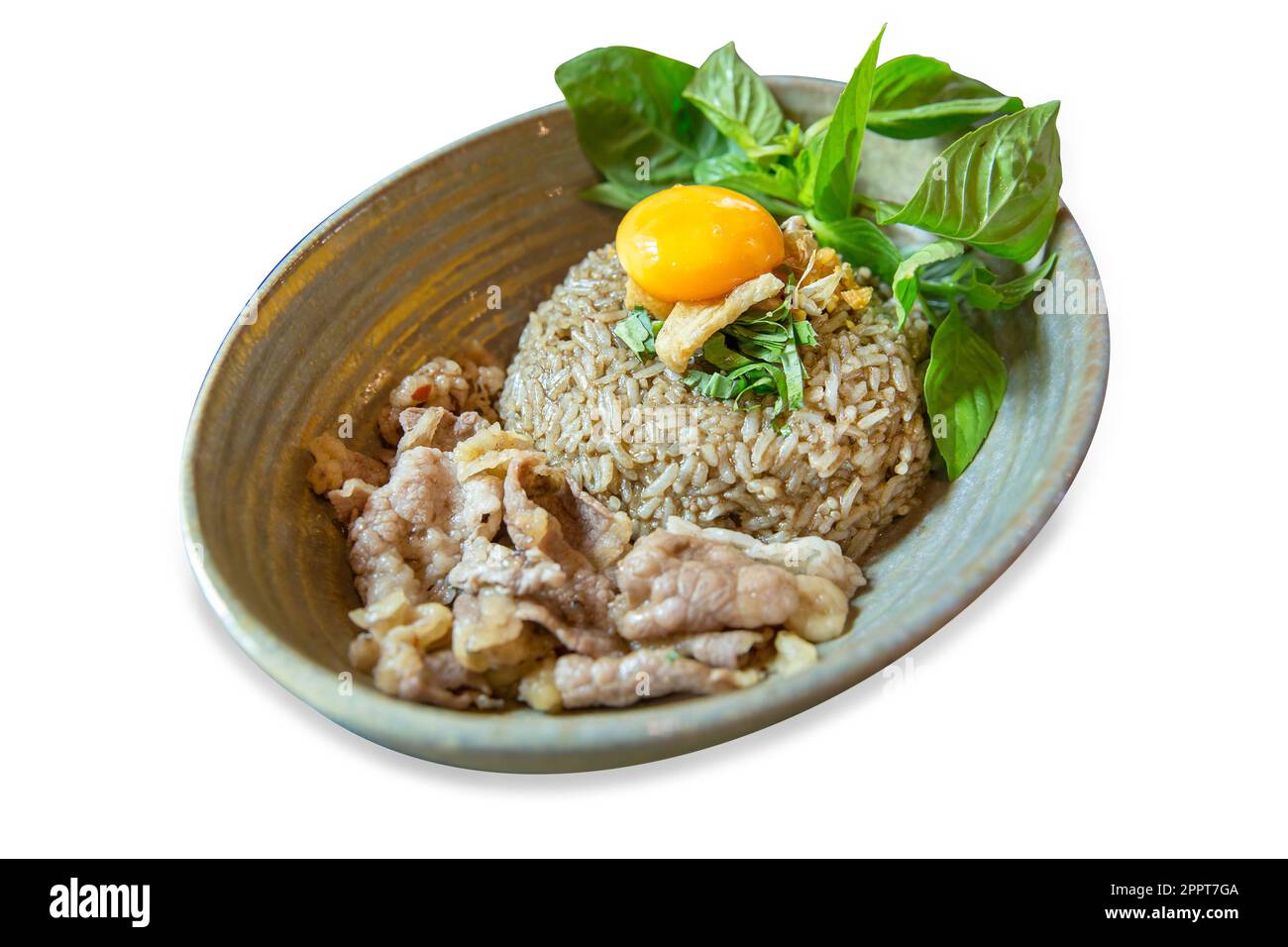 Die cut of Beef fried rice with fresh egg and green basil on white ...