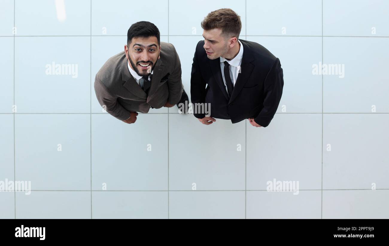 Portrait two concentrated businessmen partners hi-res stock photography ...