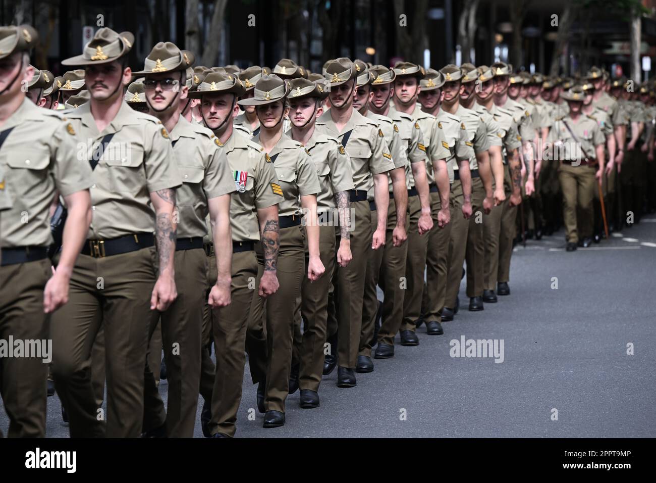 Members of the Australian Defence Force (ADF) are seen marching during ...