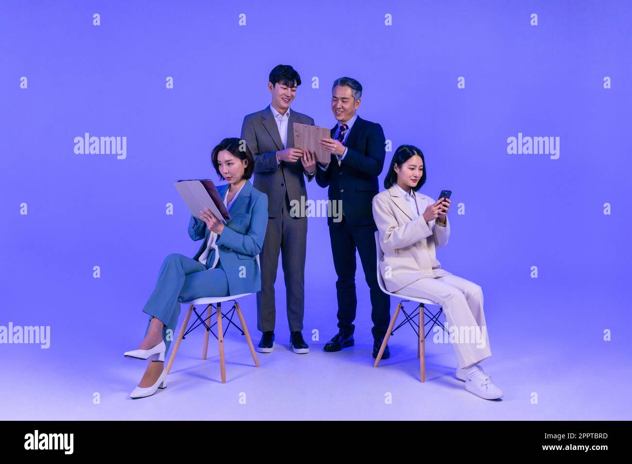 Asian Korean senior, middle aged and young male and female colleagues ...