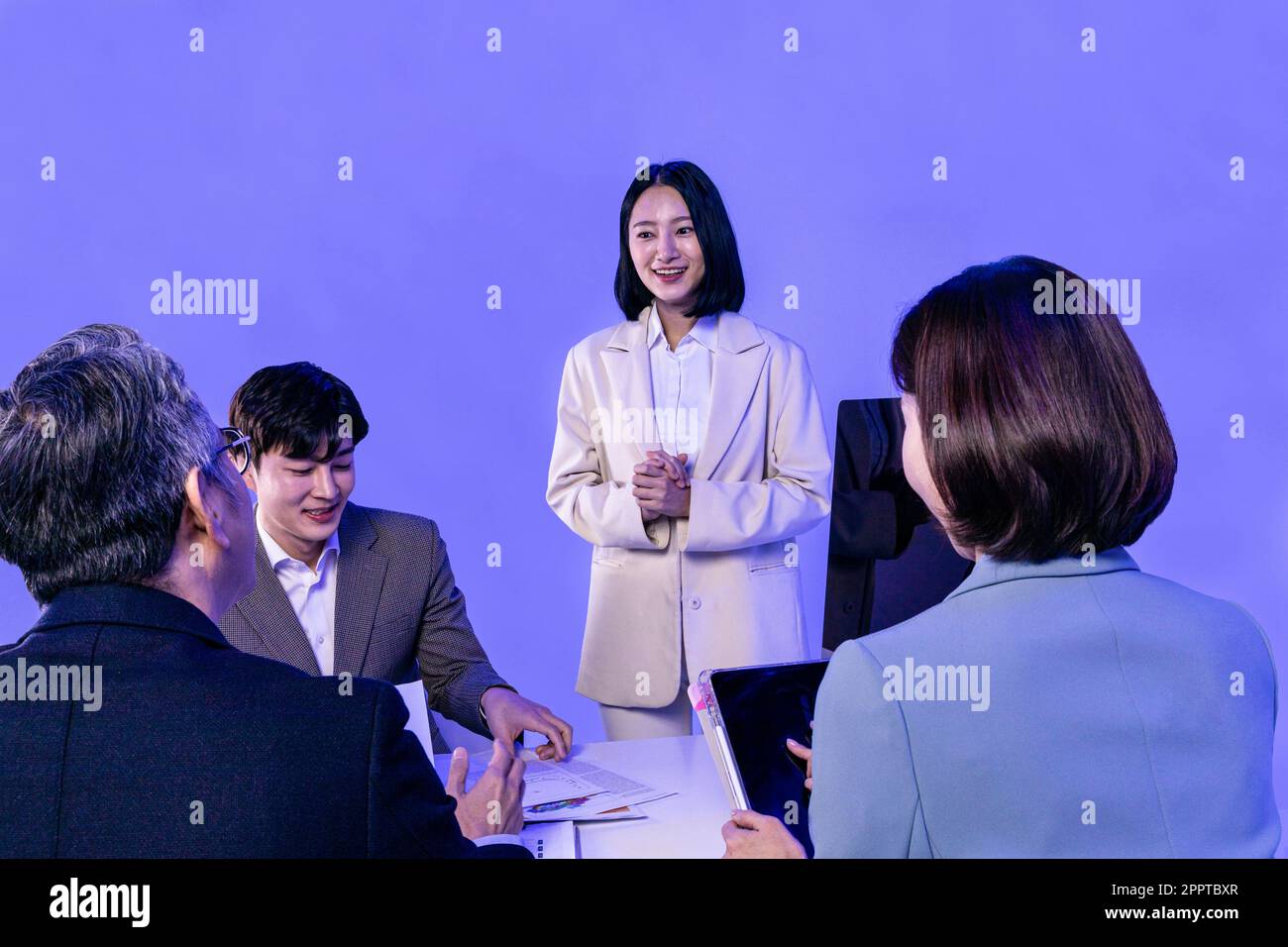 Asian Korean senior, middle aged and young male and female colleagues ...