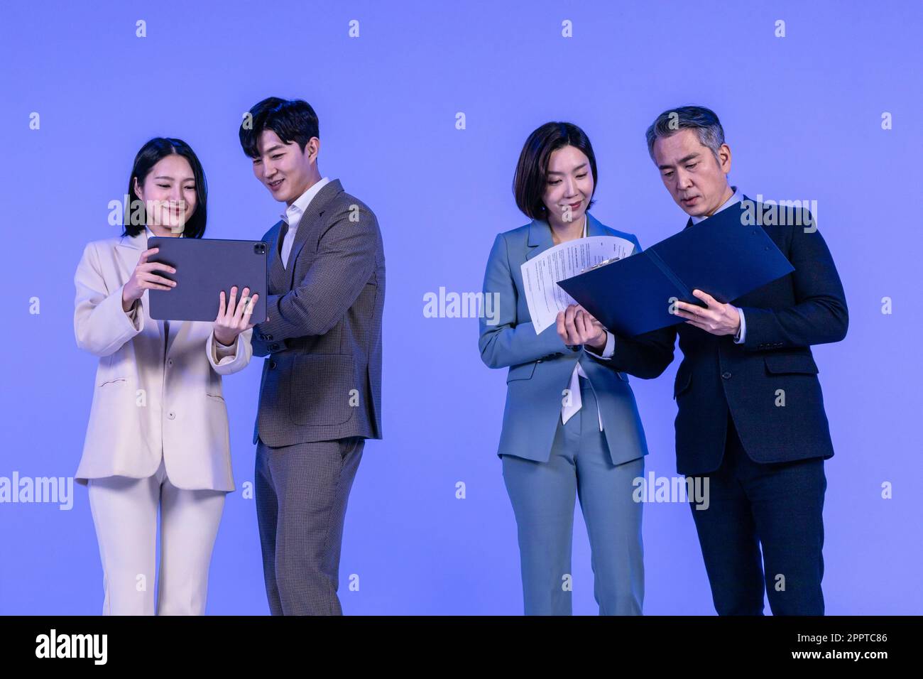 Asian Korean senior, middle aged and young male and female colleagues ...