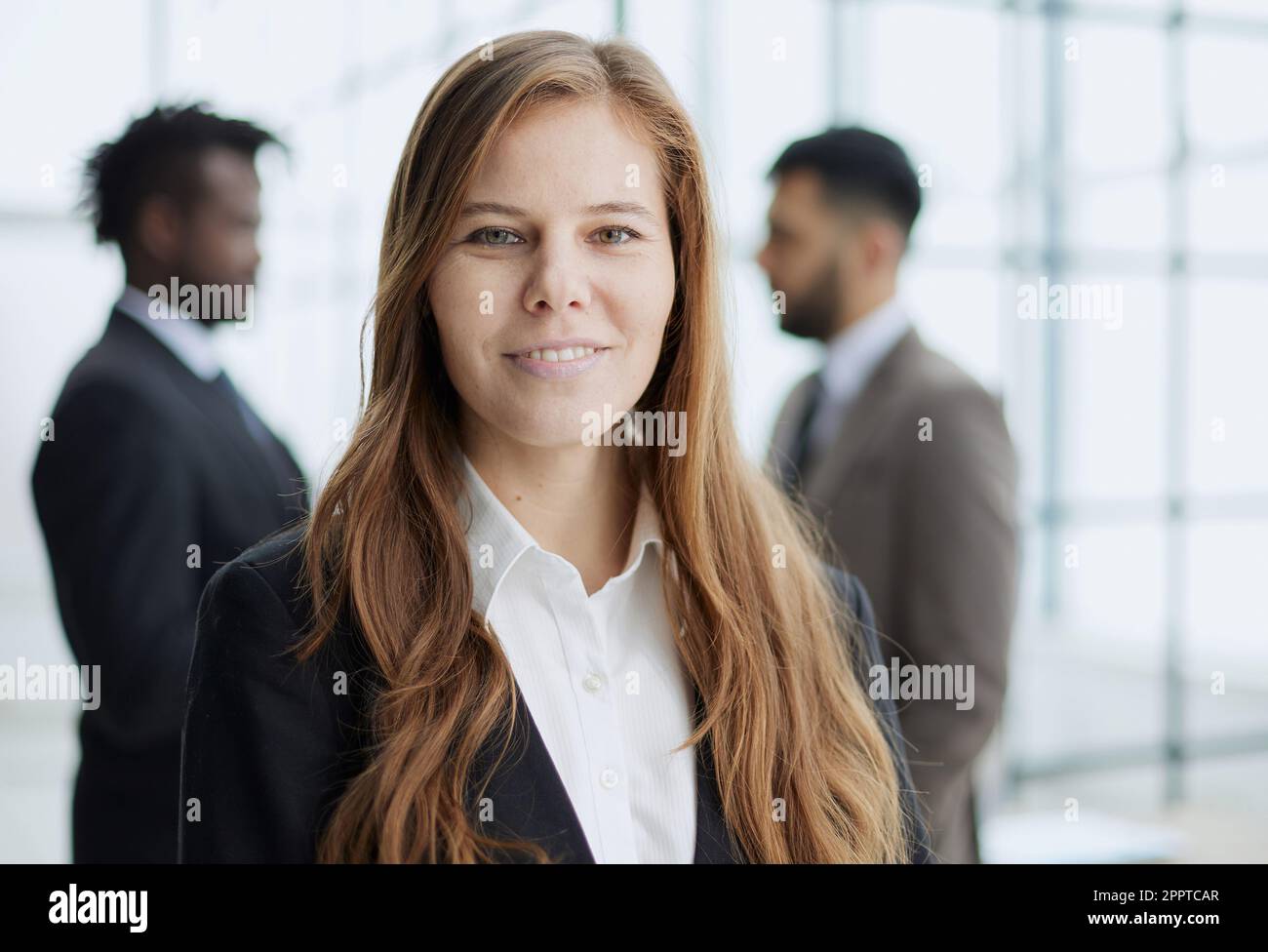 Beautiful business woman looking straight ahead with a smile Stock ...