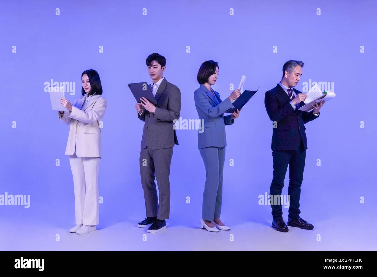 Asian Korean senior, middle aged and young male and female colleagues ...