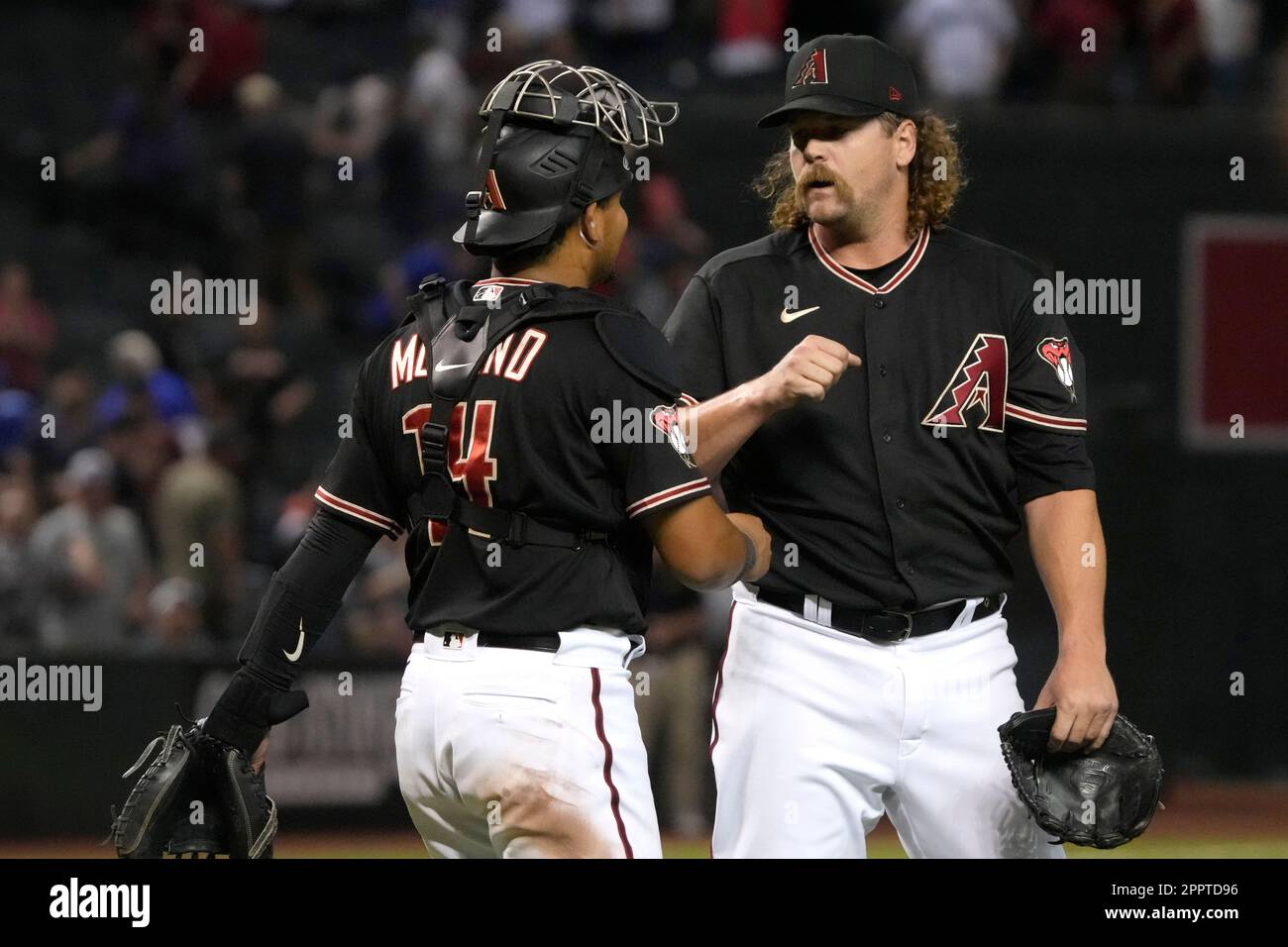 Arizona Diamondbacks catcher Gabriel Moreno (14) and pitcher Andrew ...