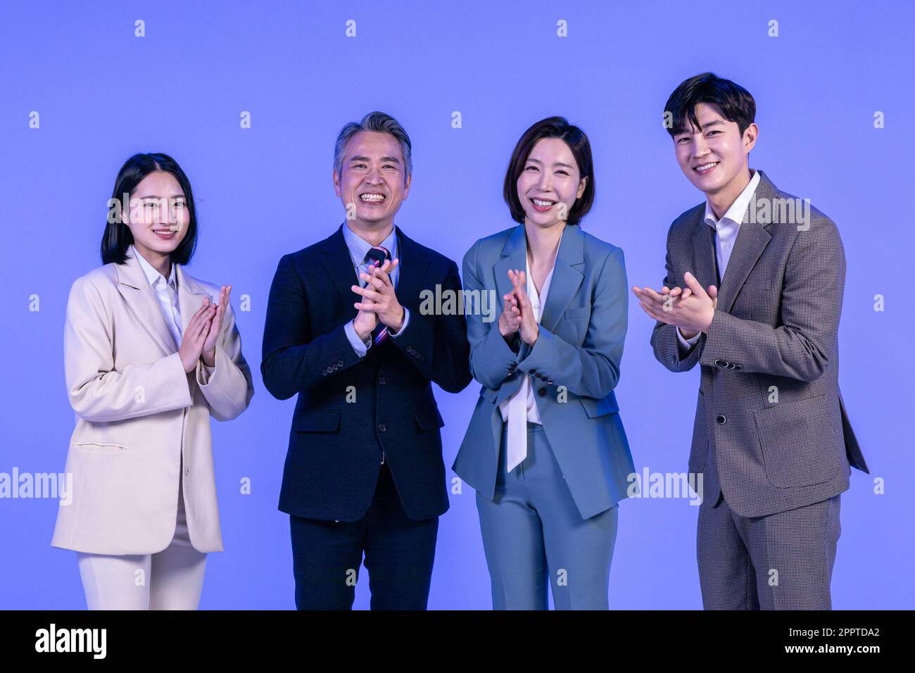 Asian Korean senior, middle aged and young male and female colleagues ...