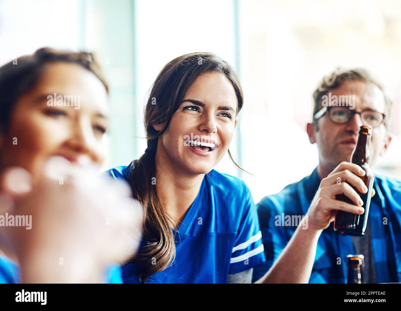 Thats a nervous laugh...A group of excited friends cheering on their ...