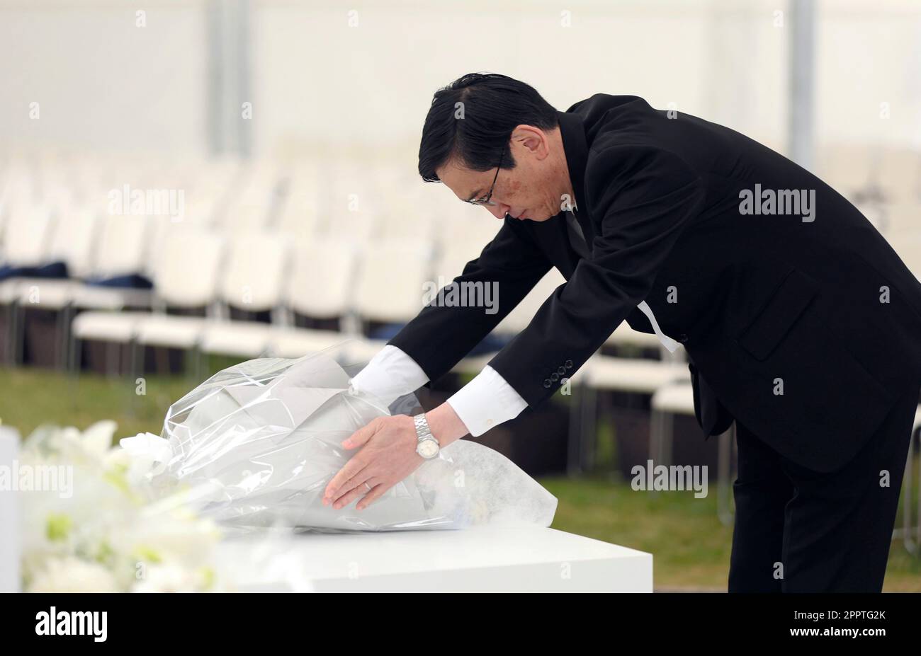 A sprit-consoling service is held near the site of the derailment accident in Amagasaki City ...