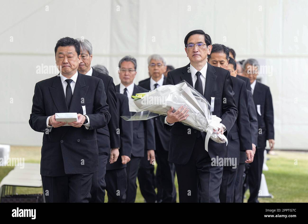 A sprit-consoling service is held near the site of the derailment accident in Amagasaki City ...